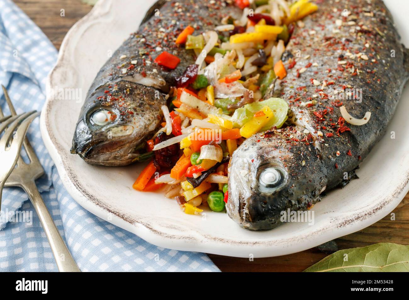 Rainbow trouts with cut vegetables. Healthy food Stock Photo - Alamy