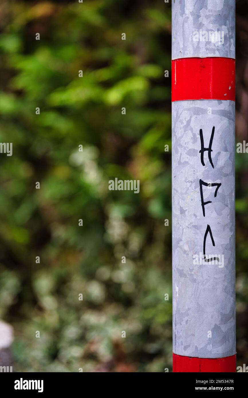 A graffiti on a metal column with "HFC" the german soccer team name ...