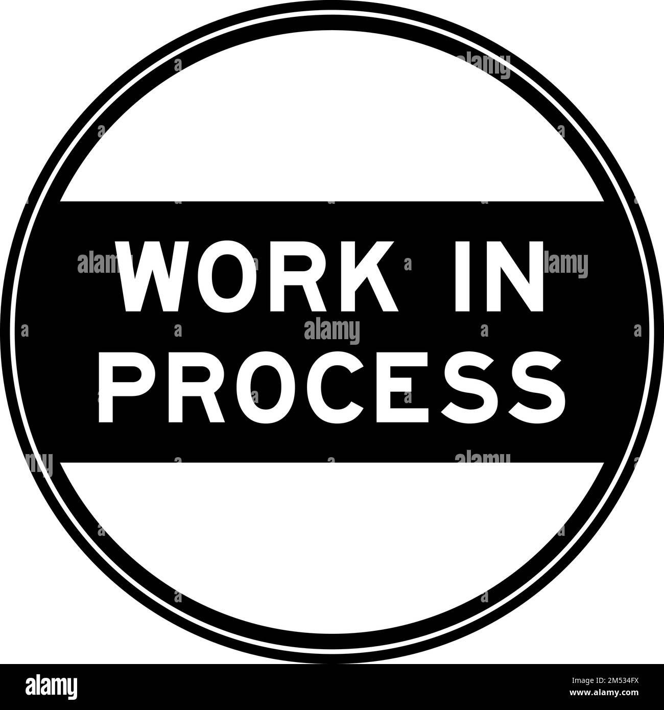Black color round seal sticker in word work in process on white ...