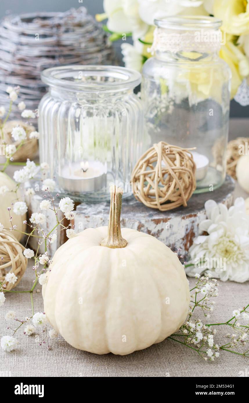Floral decoration with white pumpkins called baby boo and chrysanthemum ...