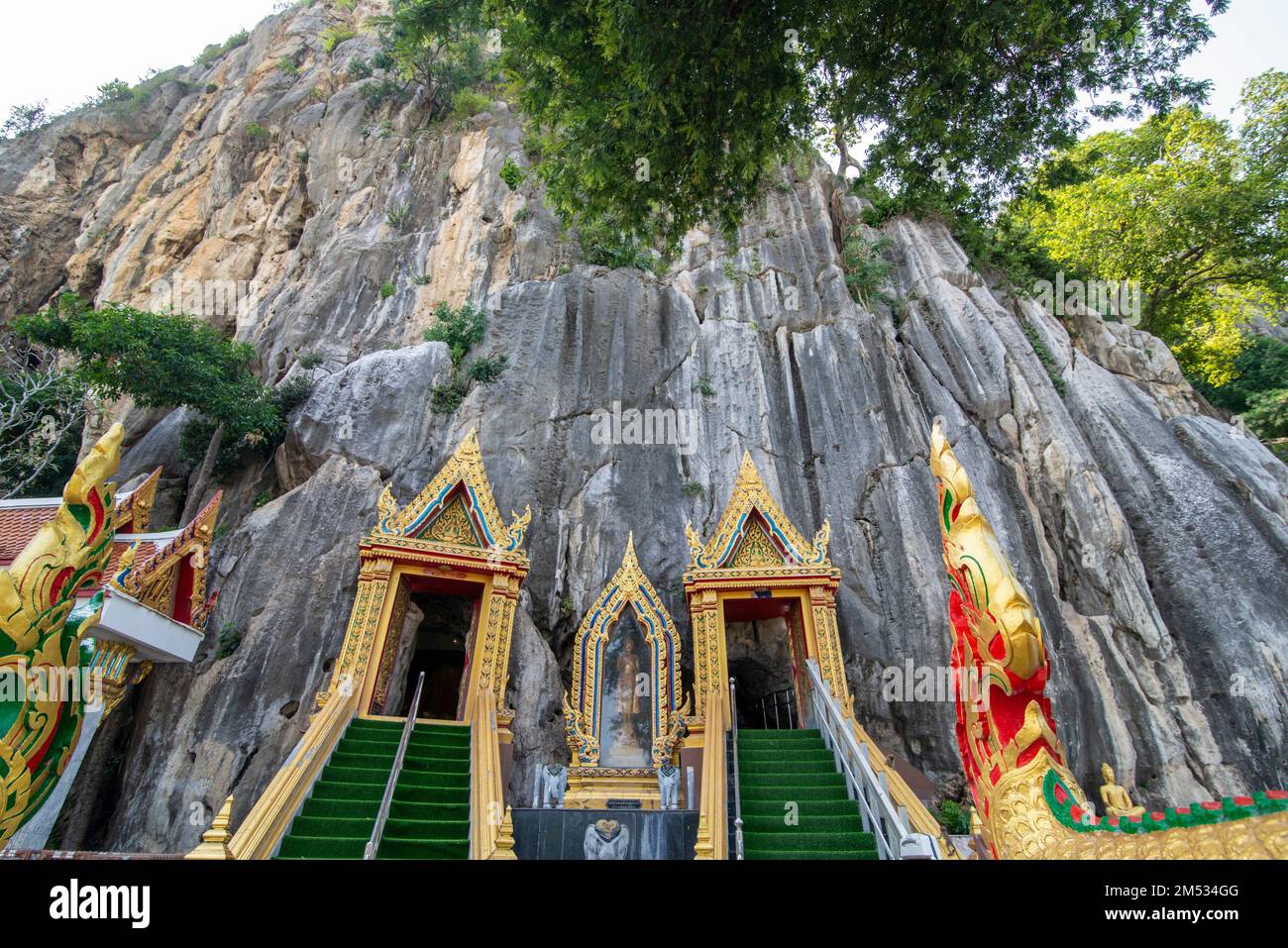 The Wat Tham Khao Yoi and Cave Temple near the city of Phetchaburi in ...