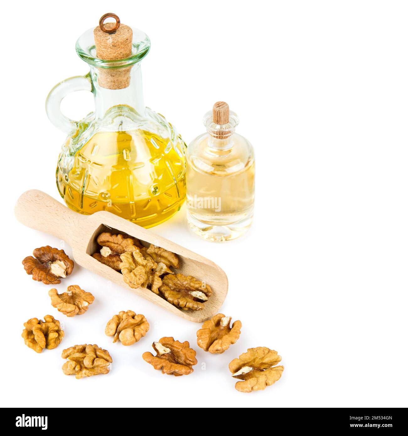 Walnut kernels and bottled nut oil isolated on white background. Free ...