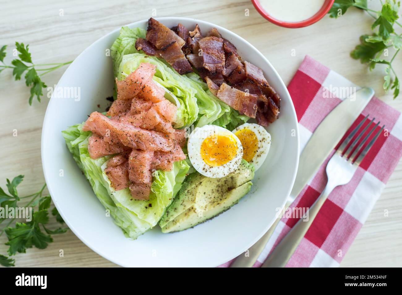 A top view of the healthy ingredients on the plate with a fork and ...