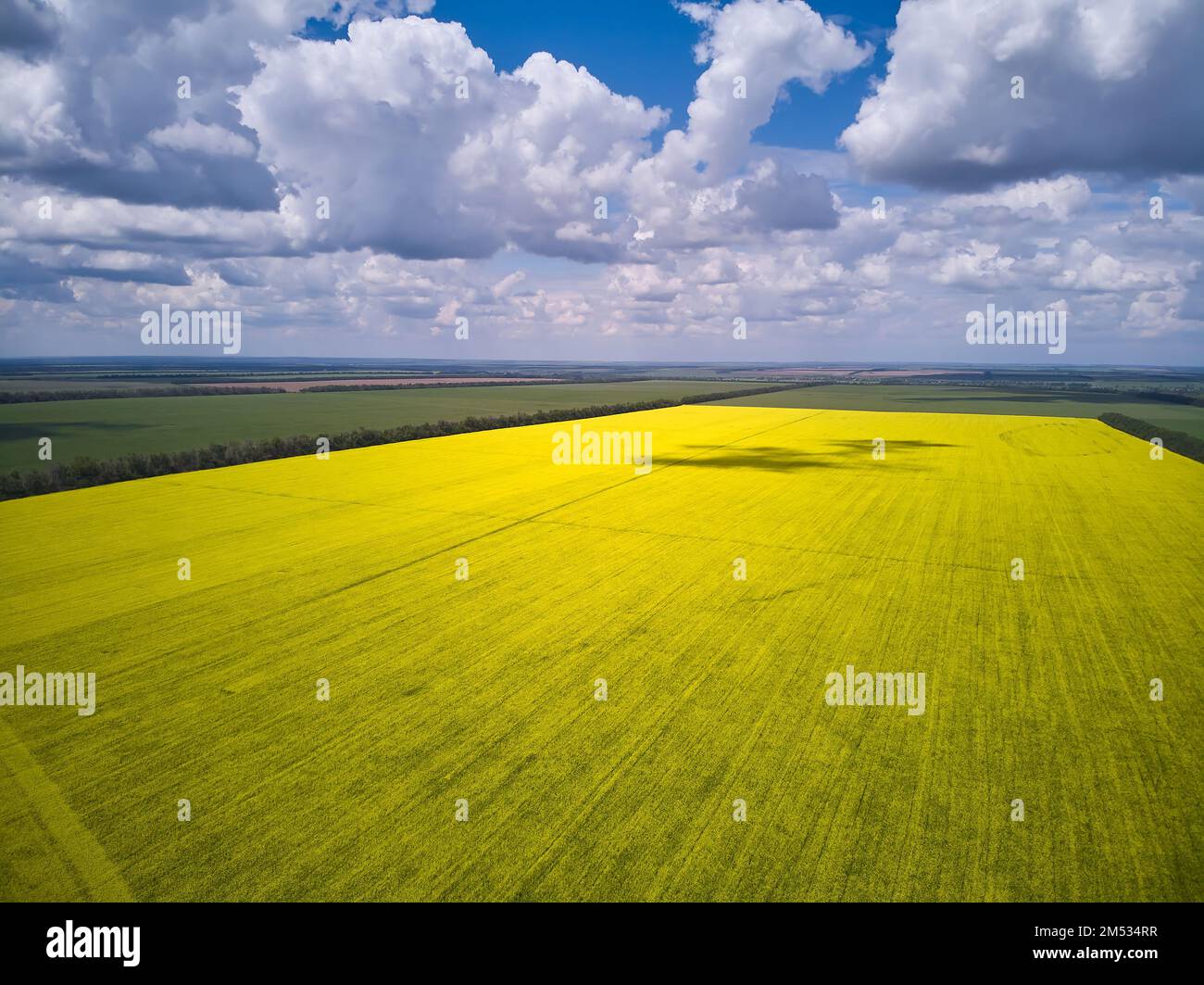 View of the fields and roads from the height of a flying drone. Bright ...