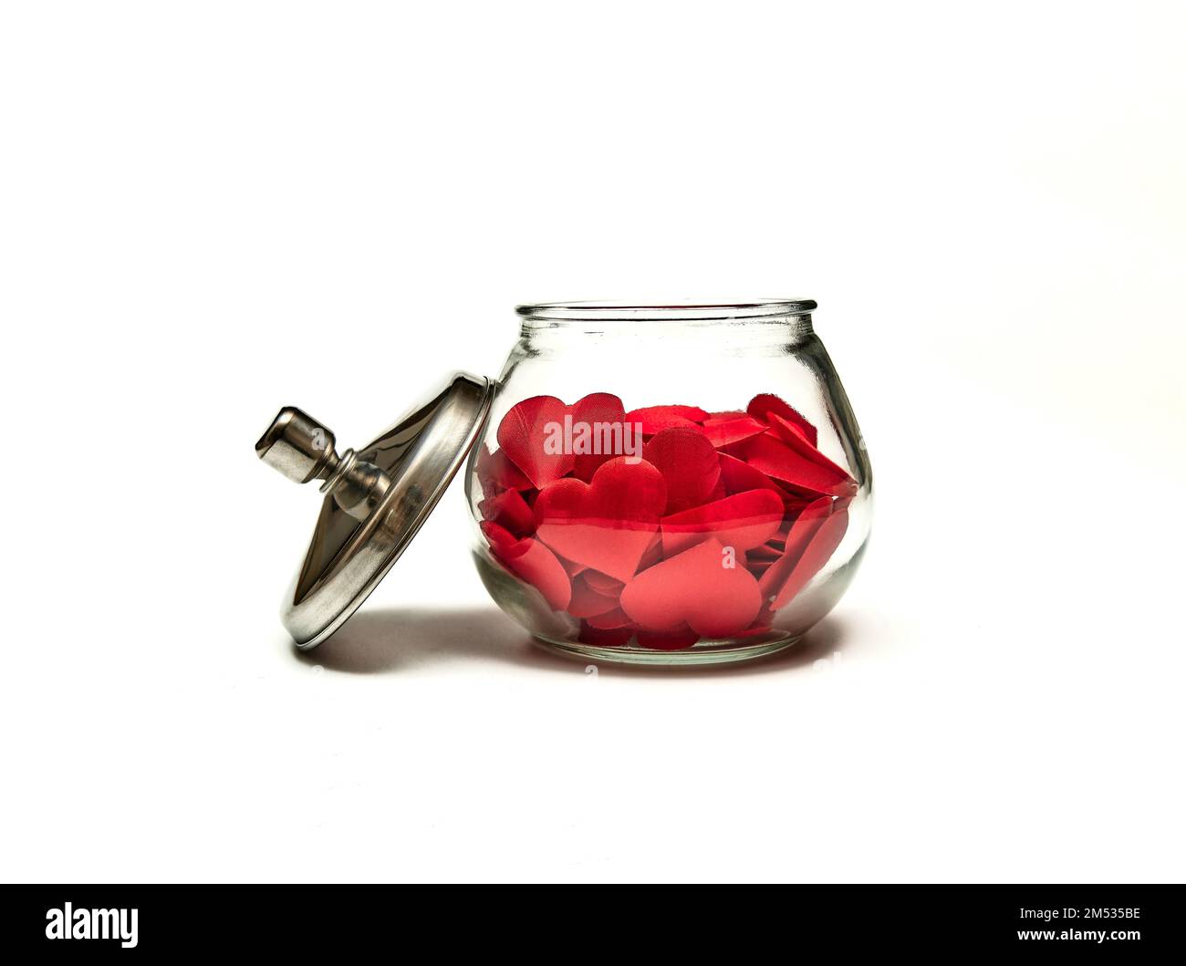 Hearts, inside transparent glass jar, isolated on white background and ...