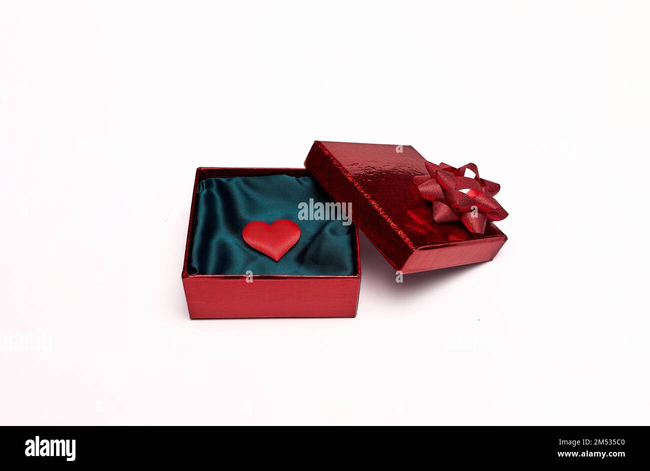 Open gift box with red heart inside, isolated on white background and ...