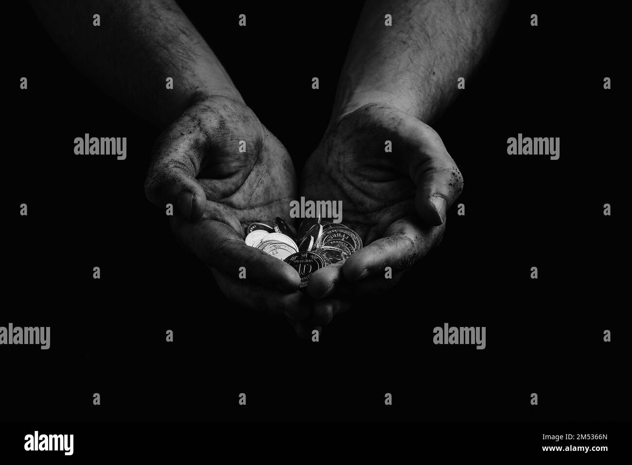 poverty in Ukraine. Black and white. Dirty hands of a poor homeless man ...
