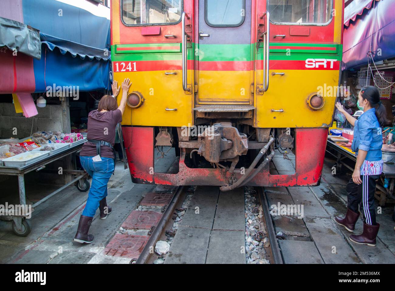 the Railway Market or Train Market in the City of Samut Songkhram or ...