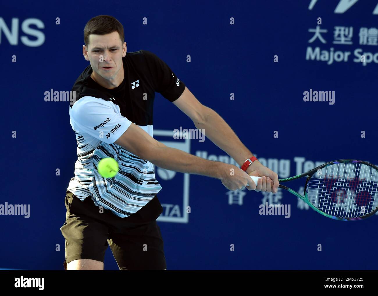 Hong Kong, China. 25th Dec, 2022. Hubert Hurkacz of Poland hits a ...