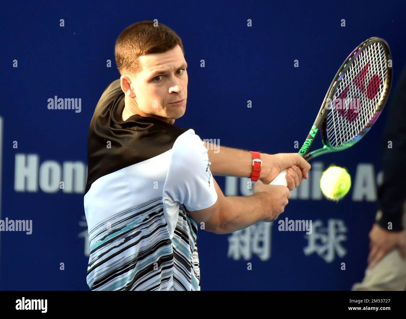Hong Kong, China. 25th Dec, 2022. Hubert Hurkacz of Poland hits a ...