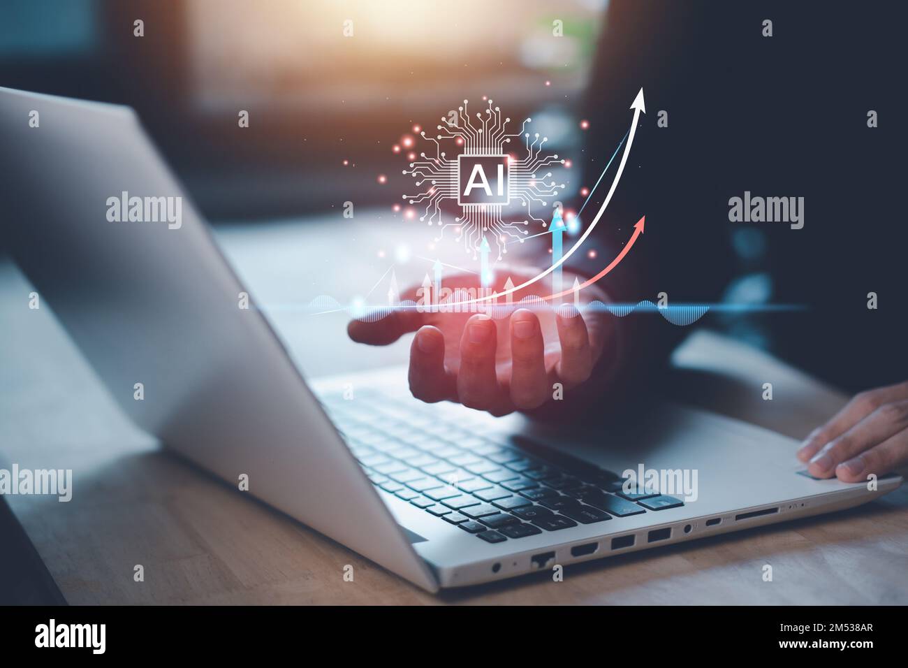 AI (Artificial intelligence) growing concept. Businessman hand typing ...