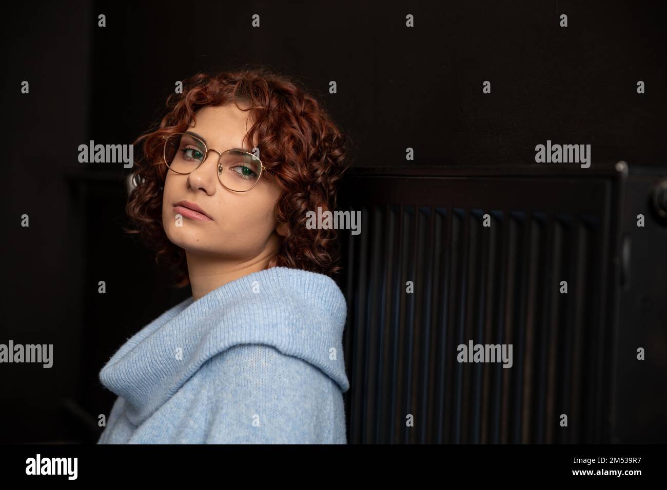 Leaning against radiator hi-res stock photography and images - Alamy