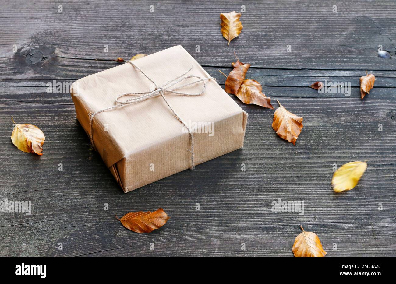 Vintage postal parcel on wooden table Stock Photo - Alamy