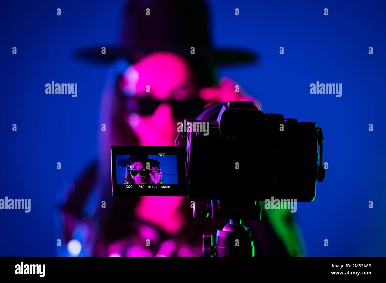 Backstage how operator working with professional camera. Videographer ...