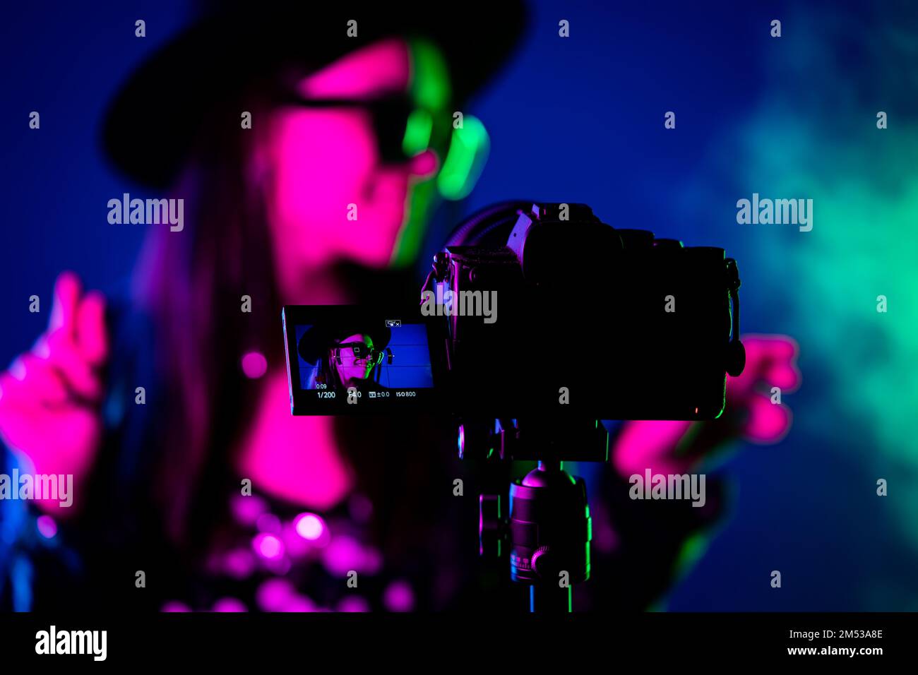 Backstage how operator working with professional camera. Videographer ...