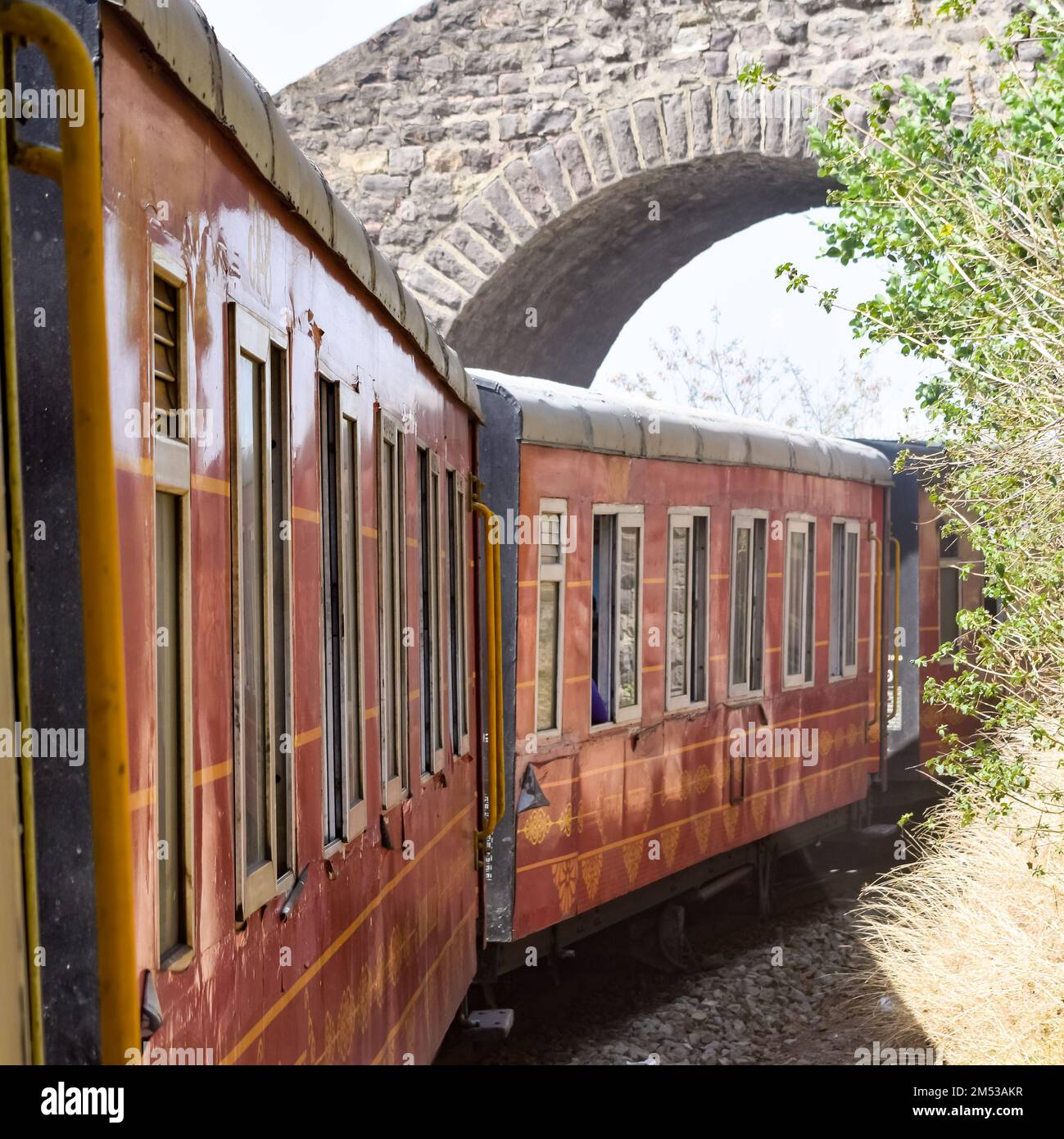 Toy Train moving on mountain slopes, beautiful view, one side mountain ...