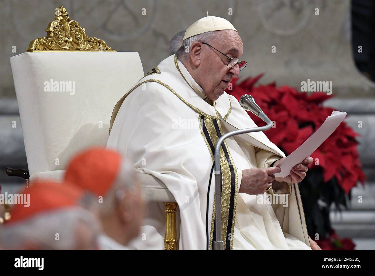 Pope Francis, in a wheel chair, celebrates the Christmas Eve mass at St ...