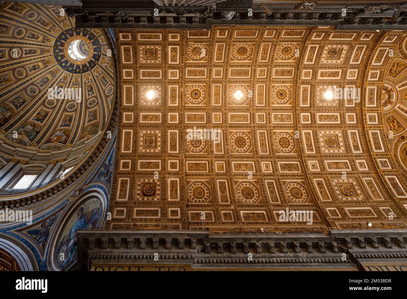A low angle shot of the interior of Saint Peter's Basilica with vaulted ...