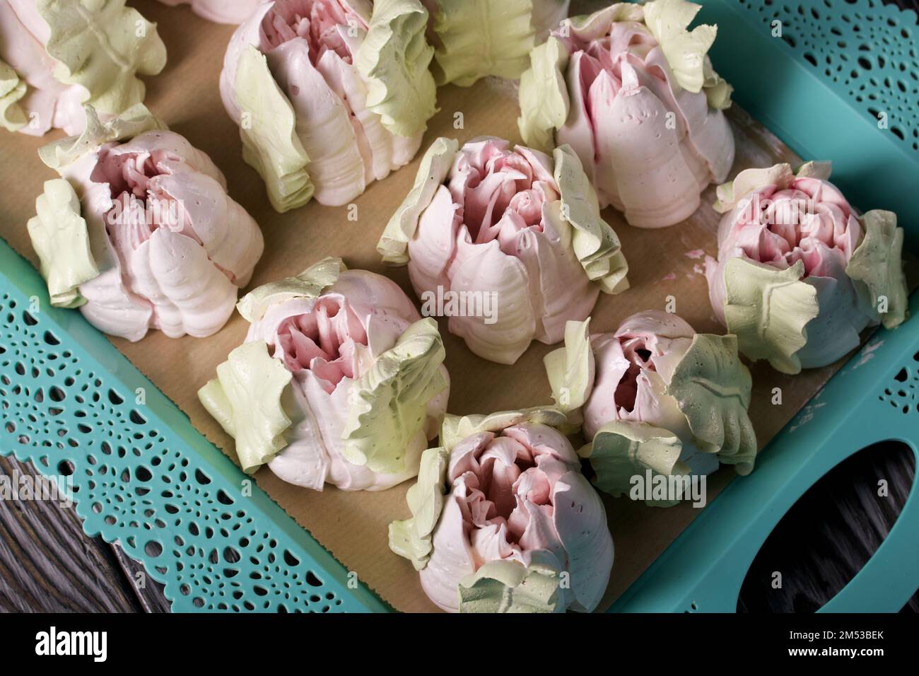 Zephyr tulips. Natural homemade marshmallow. Arranged on a tray. Close ...