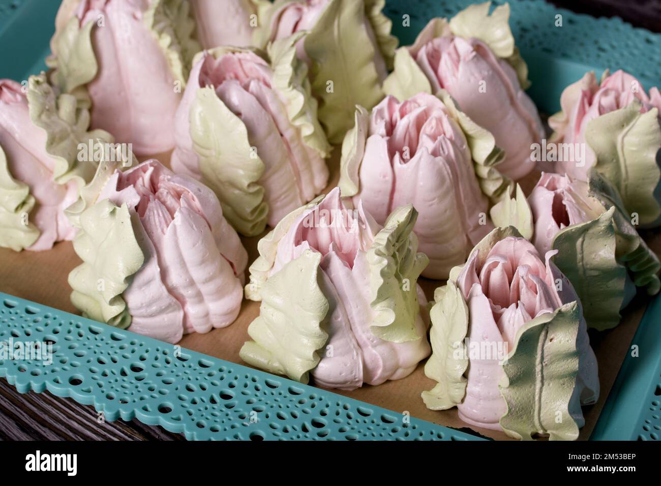 Zephyr tulips. Natural homemade marshmallow. Arranged on a tray. Close ...