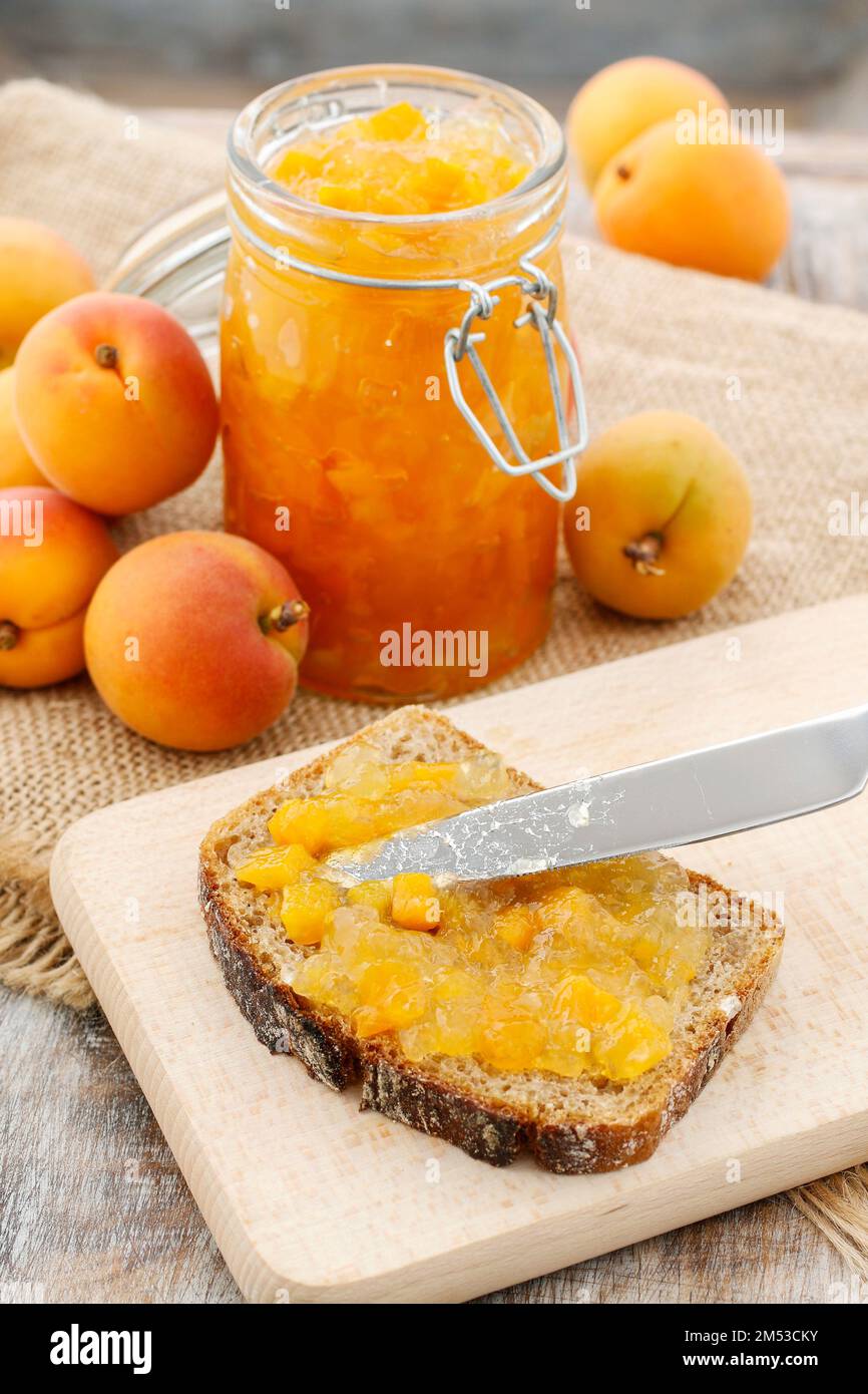 Bread with peach jam. Healthy food Stock Photo - Alamy