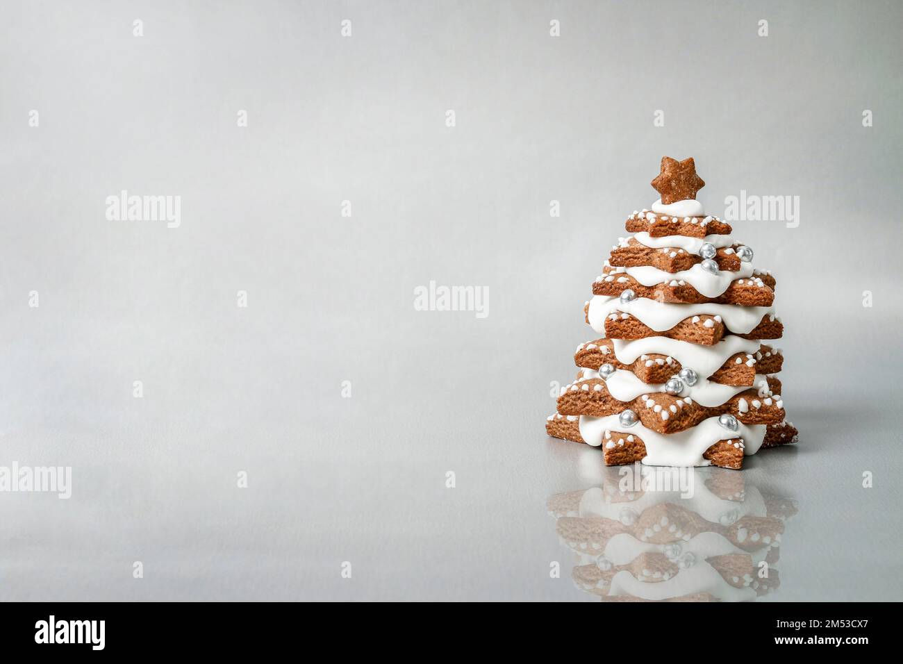 Gingerbread Christmas tree on silver background, copy space Stock Photo ...