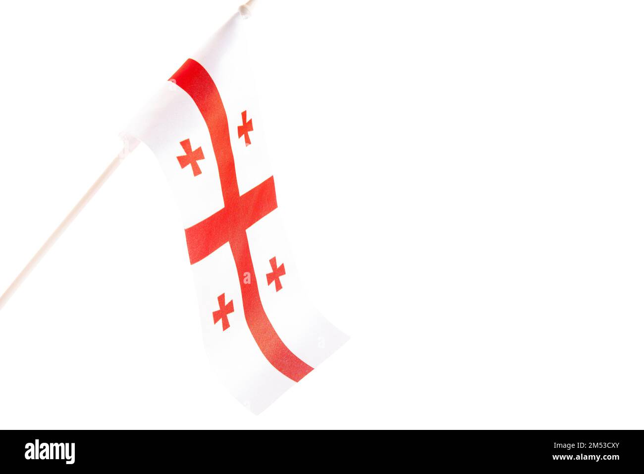 The Flag Of Georgia On A White Background Develops And Flies Waving In