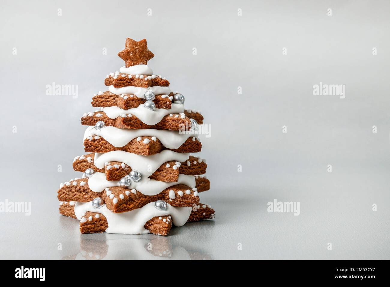 Gingerbread Christmas tree on silver background, copy space Stock Photo ...