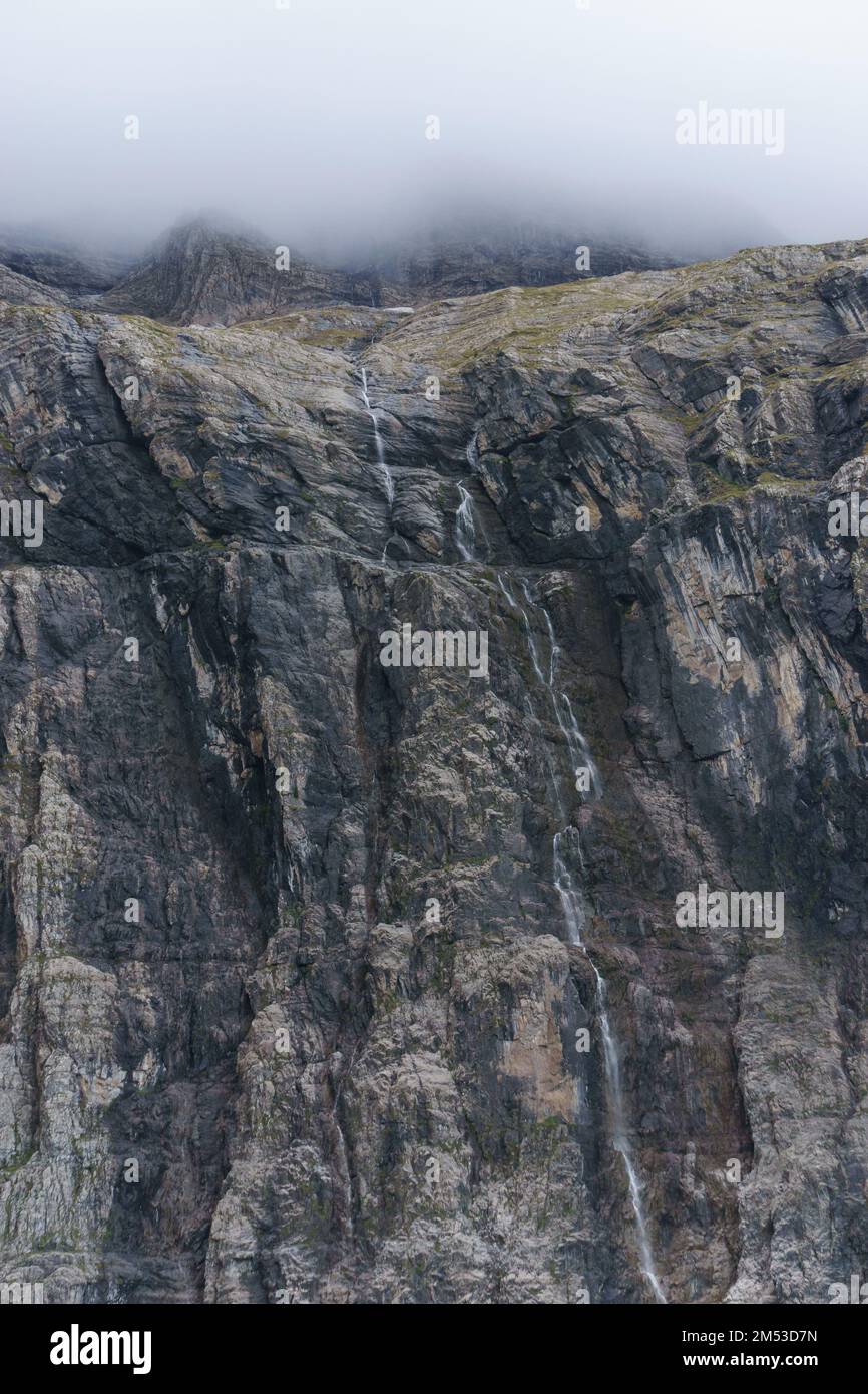 Cirque de Gavarnie with big waterfall at massive high rock wall ...