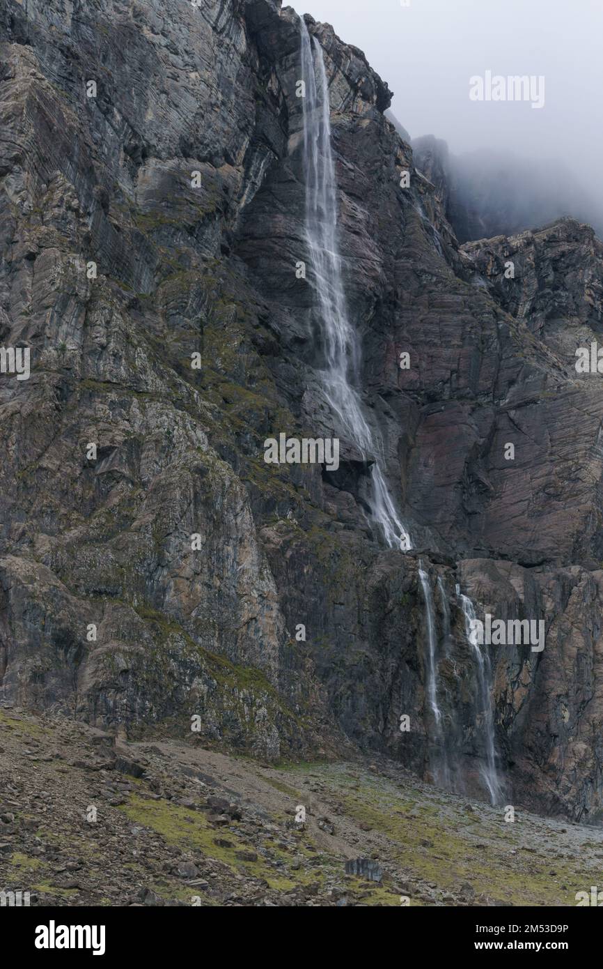 Cirque de Gavarnie with big waterfall at massive high rock wall ...