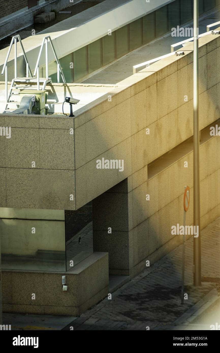 Security office in a building with a granite facade at street level ...