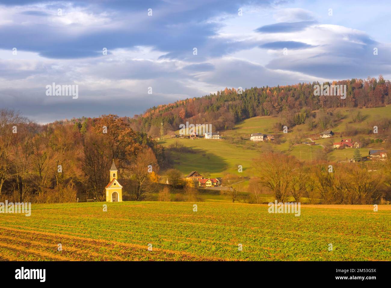 Agricultural fields and yellow little chapel in the charming town of ...