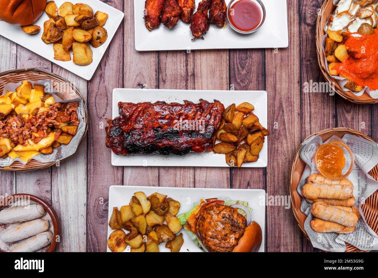 Set of fast food dishes with pork ribs with potatoes, assorted ...