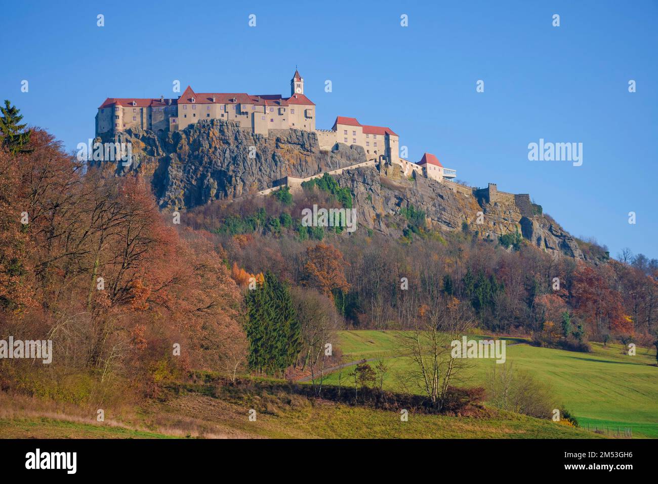 The medieval Riegersburg Castle on top of a dormant volcano, surrounded ...