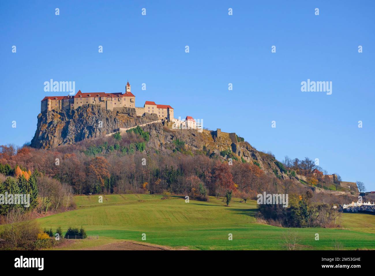 The medieval Riegersburg Castle on top of a dormant volcano, surrounded ...