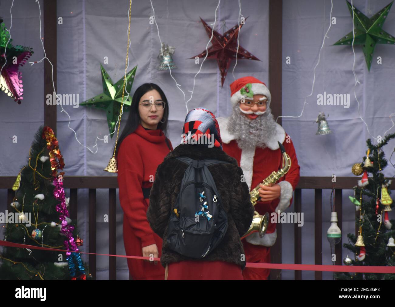 Srinagar, India. 25th Dec, 2022. Veiled Kashmiri Muslim women celebrate ...