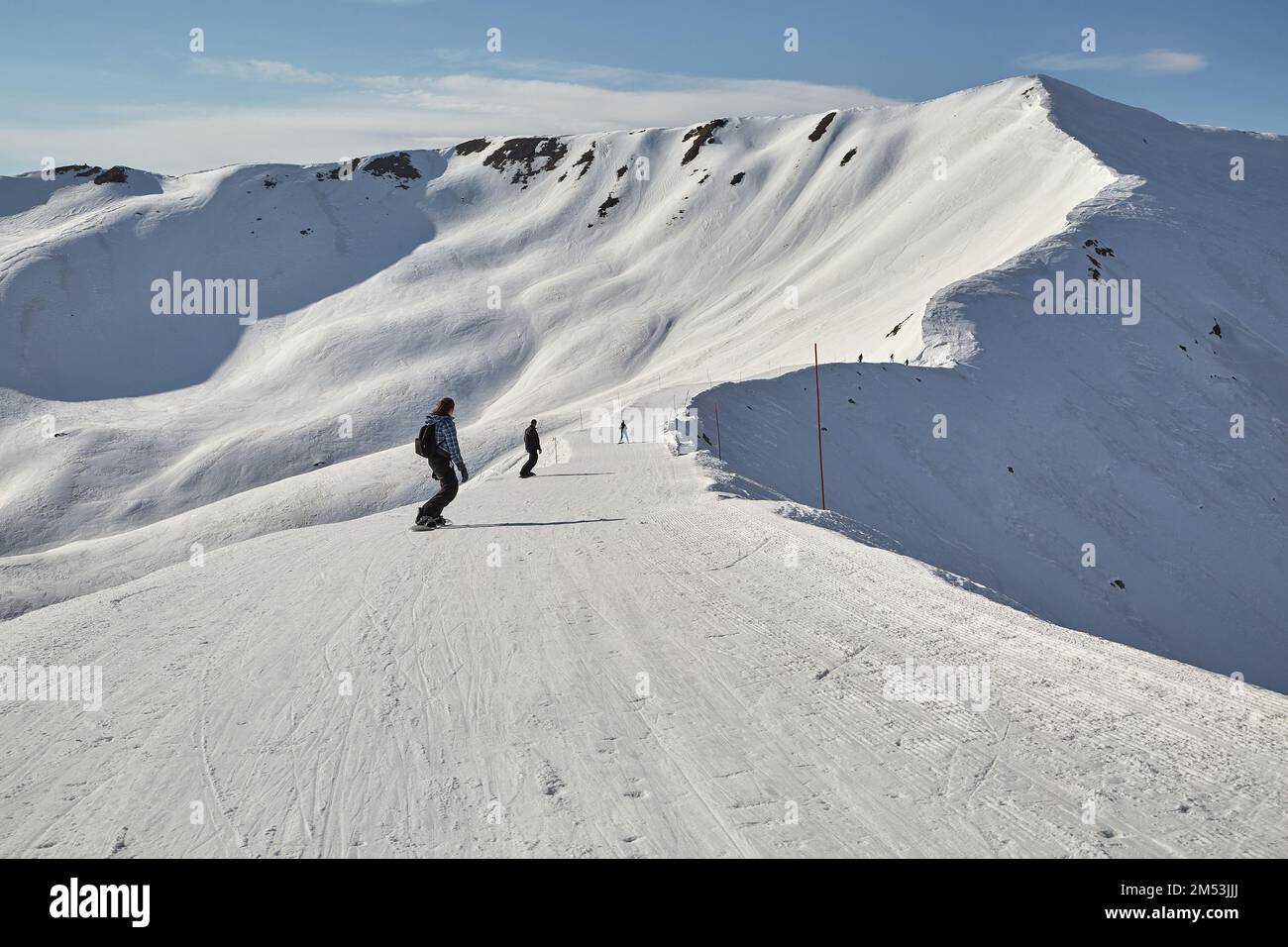People skiing down hill hi-res stock photography and images - Alamy