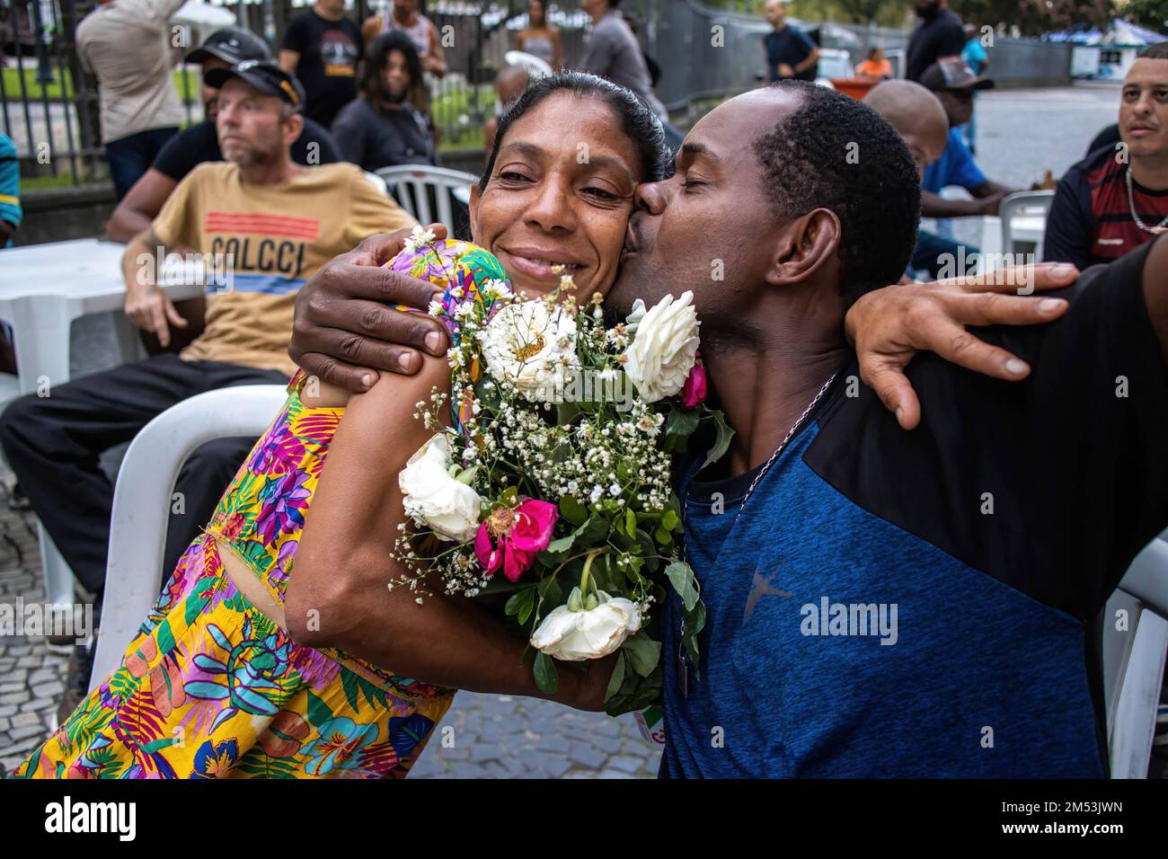 Rio De Janeiro, Brazil. 24th Dec, 2022. A homeless couple hugs while ...
