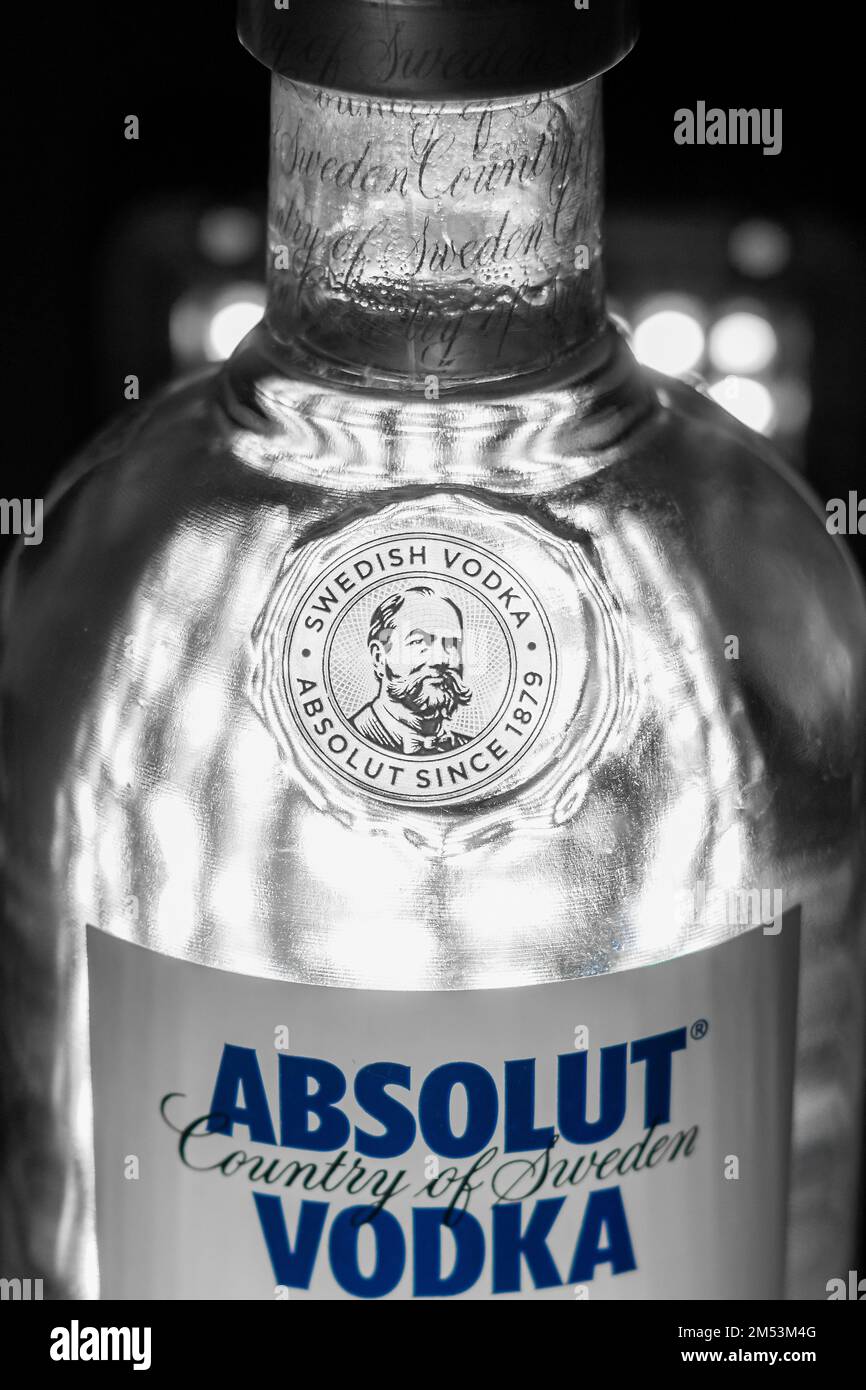 A vertical shot of a Limited edition Absolut Vodka bottle placed in ...