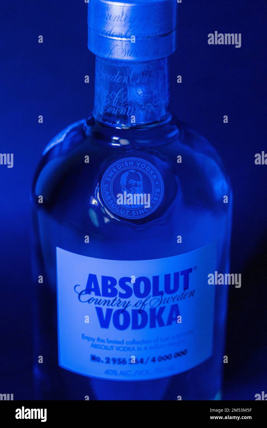 A vertical shot of a Limited edition Absolut Vodka bottle with blue ...
