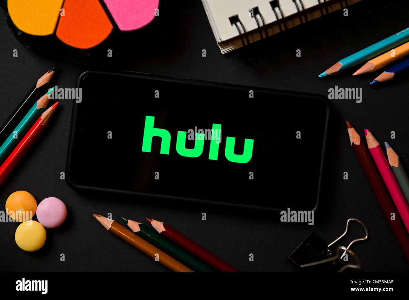 In this photo illustration a Hulu logo seen displayed on a smartphone ...