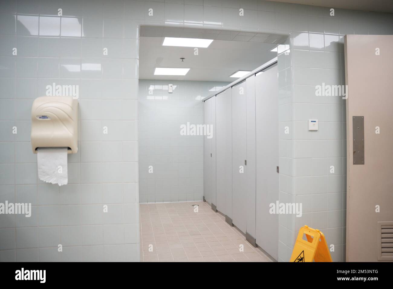 Public bathroom toilet rooms on the hall with tissue machine Stock ...