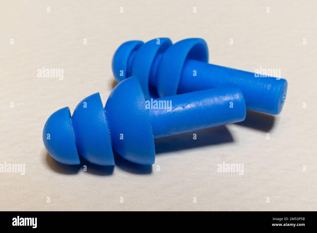 Silicone ear plugs for human ears on white background Stock Photo - Alamy
