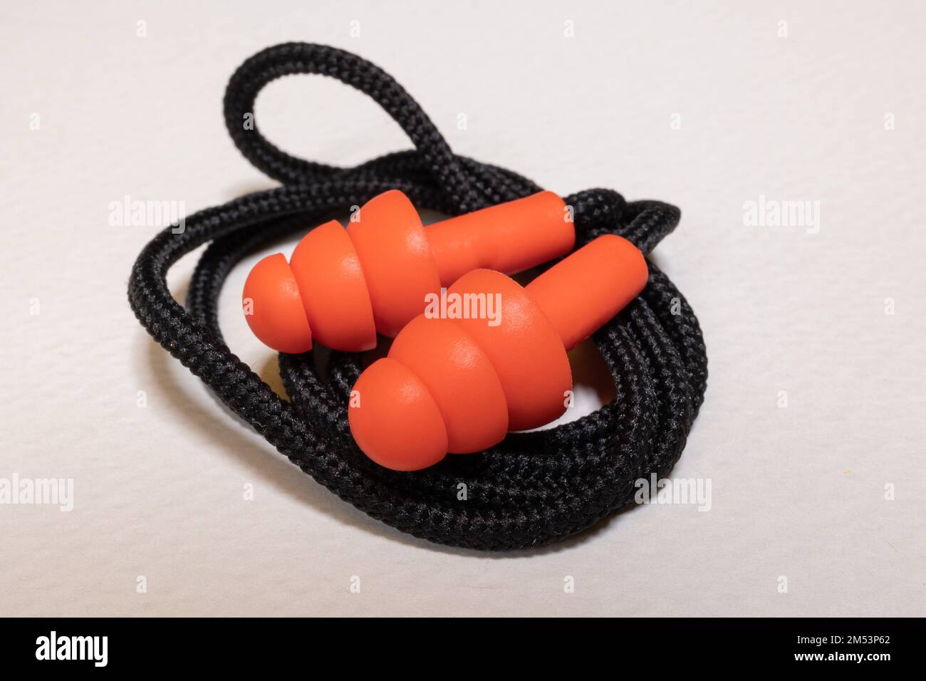 Silicone ear plugs for human ears on white background Stock Photo - Alamy