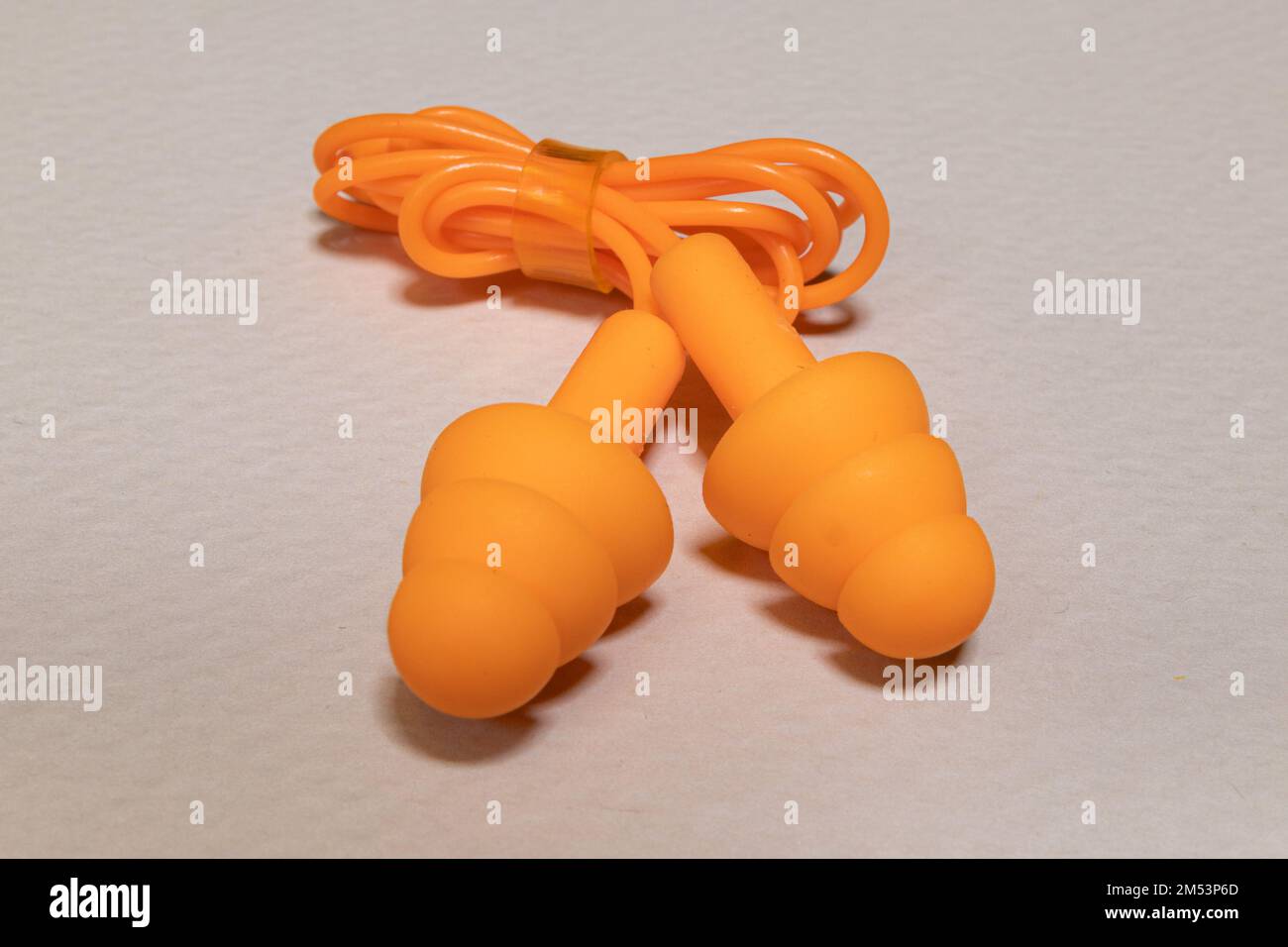 Silicone ear plugs for human ears on white background Stock Photo - Alamy
