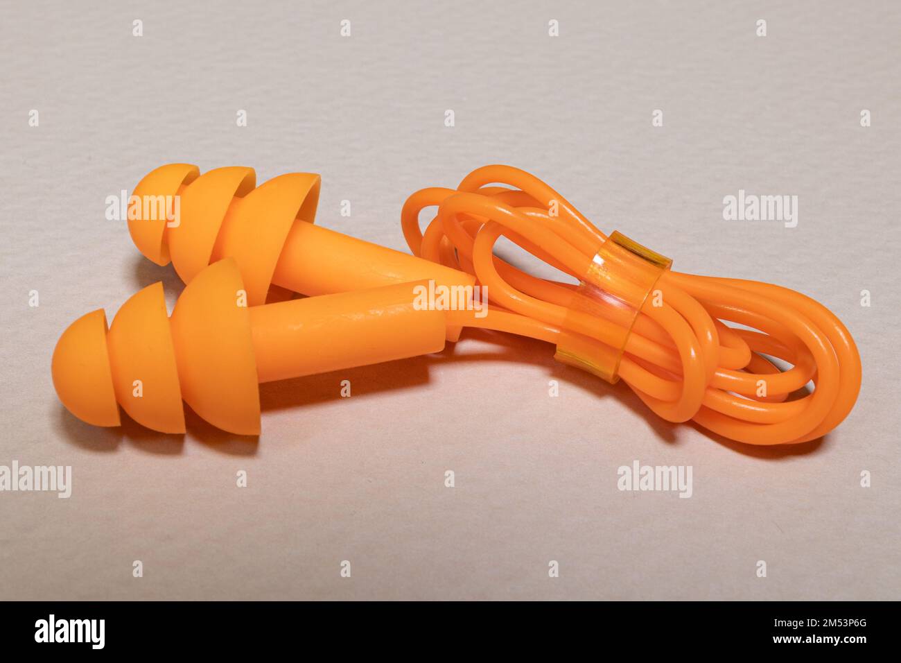 Silicone ear plugs for human ears on white background Stock Photo - Alamy