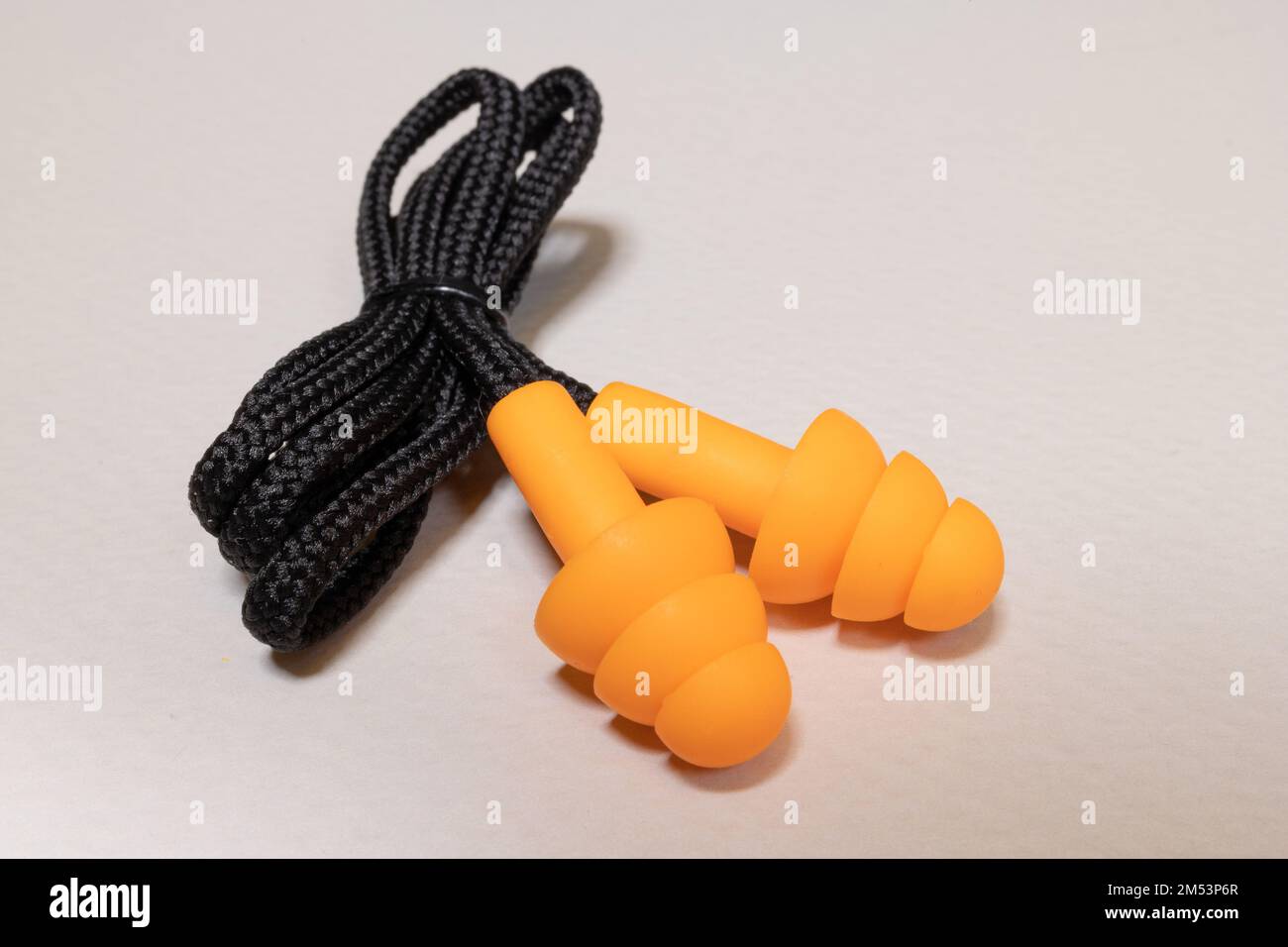 Silicone ear plugs for human ears on white background Stock Photo - Alamy