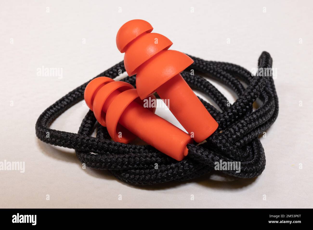 Silicone ear plugs for human ears on white background Stock Photo - Alamy