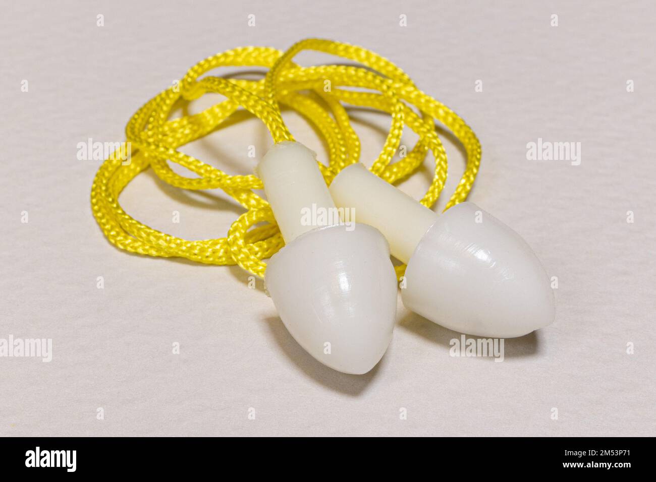 Silicone ear plugs for human ears on white background Stock Photo - Alamy