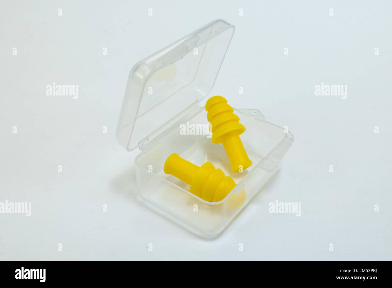 Silicone ear plugs for human ears on white background Stock Photo - Alamy